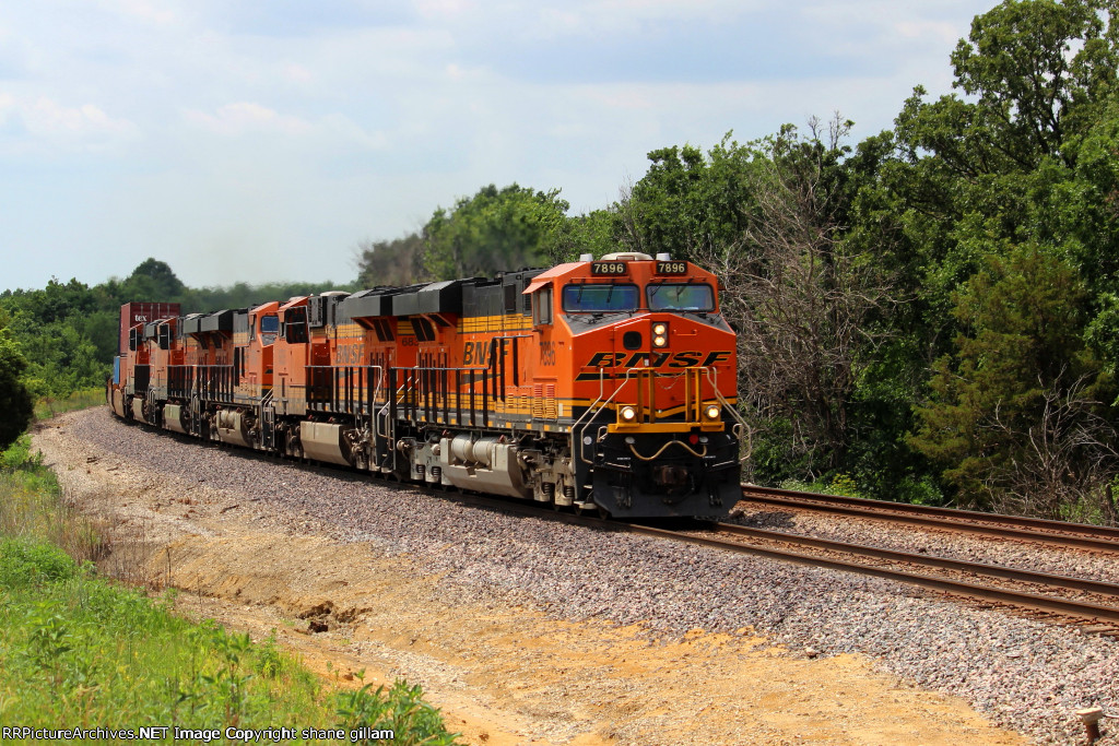 BNSF 7896 leads a Eb stack train past mp 302.2.